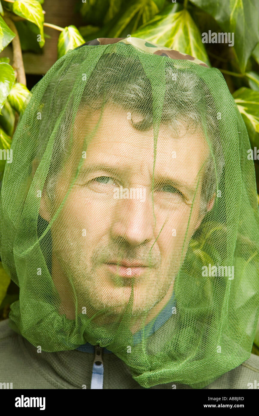 Man wearing a mosquito net hi-res stock photography and images - Alamy