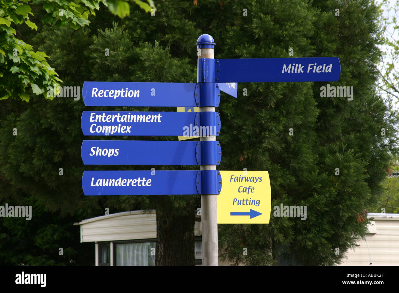 Group of directional signs on a post at a holiday park Stock Photo - Alamy