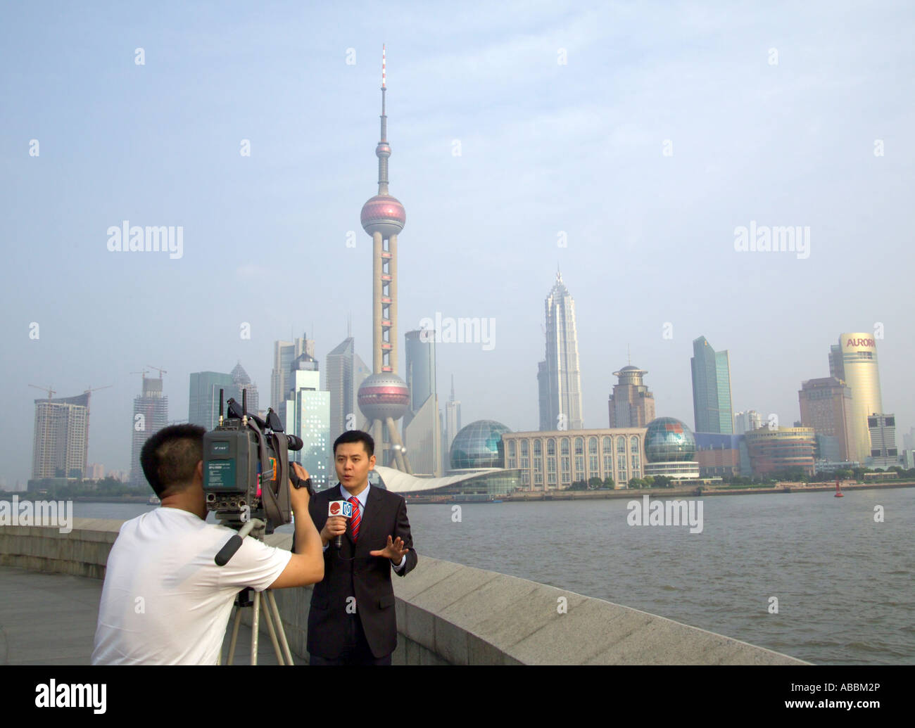 Chinese TV presenter at the Bund Stock Photo - Alamy