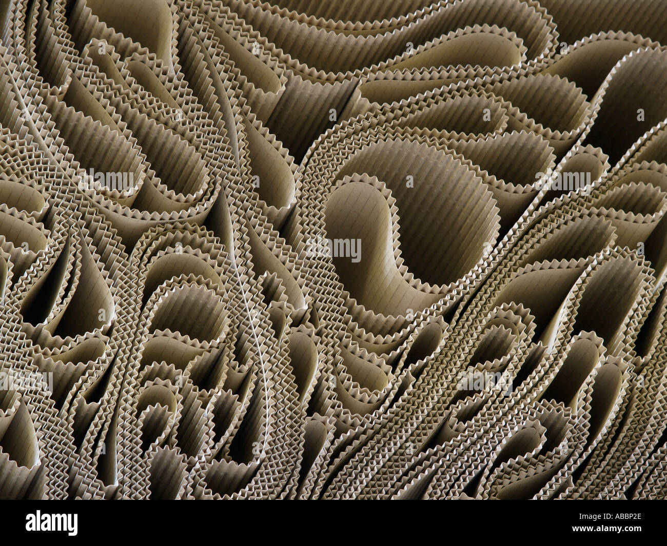 Ribbed cardboard graphical pattern buffer between two giant rolls in a ...