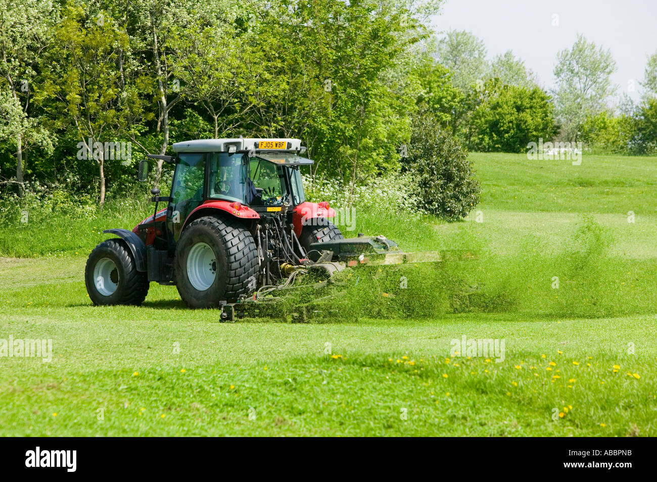 cutting the grass on a field in Leicester with a mechanical mower, UK ...