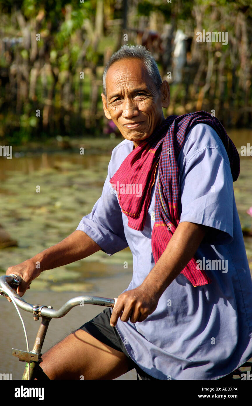 Khmer man on his bicycle near Kompong Thom Cambodia Stock Photo - Alamy
