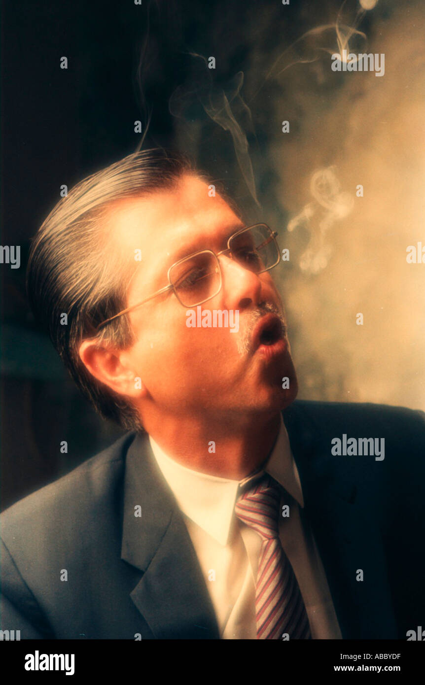 Smoking man suit and tie hi-res stock photography and images - Alamy
