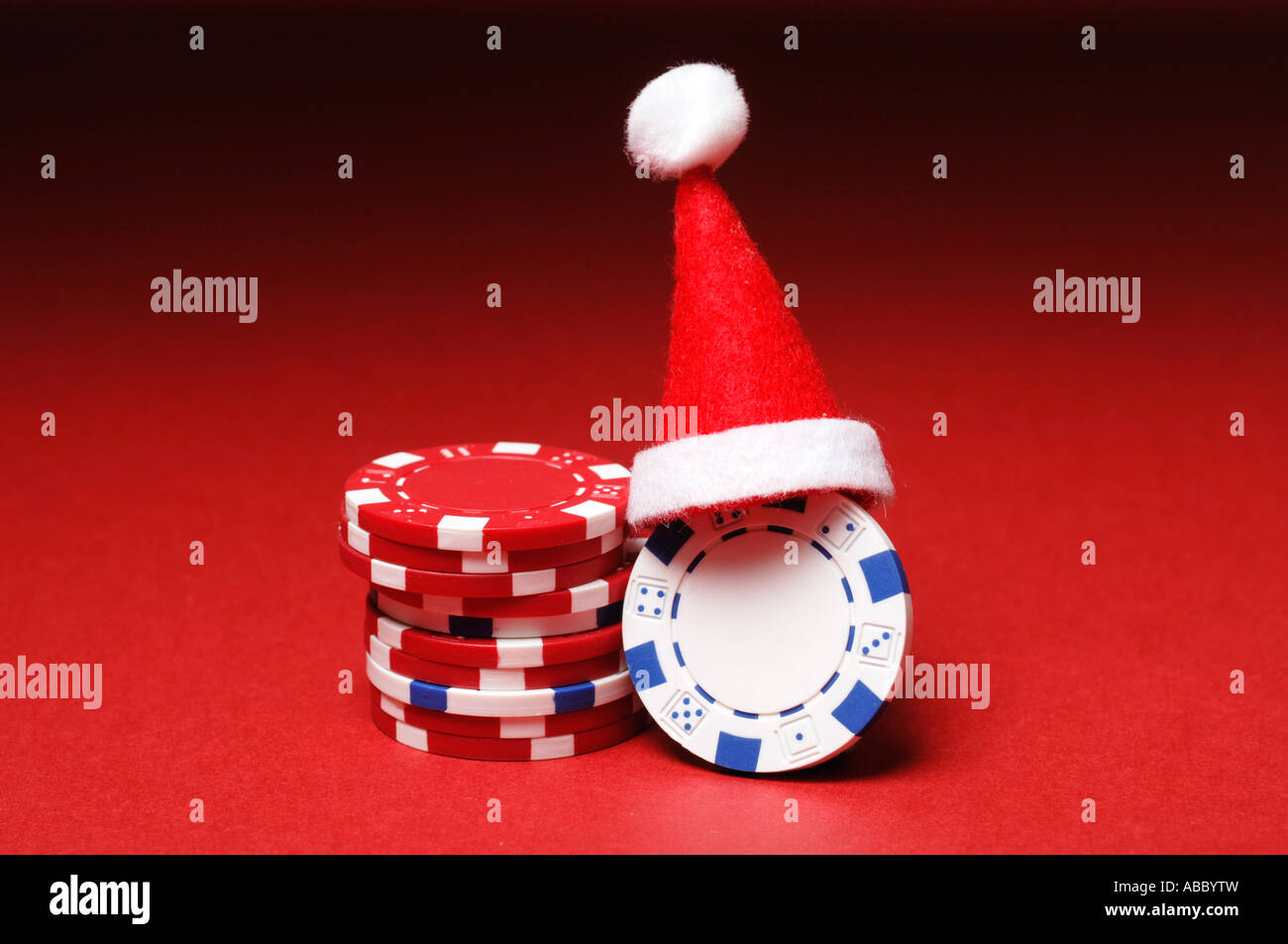 Poker chips with santa hat Stock Photo - Alamy