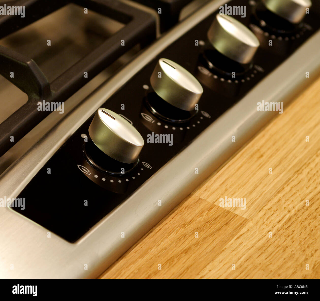 Detail of knobs and dials on a contemporary gas cooker Stock Photo - Alamy
