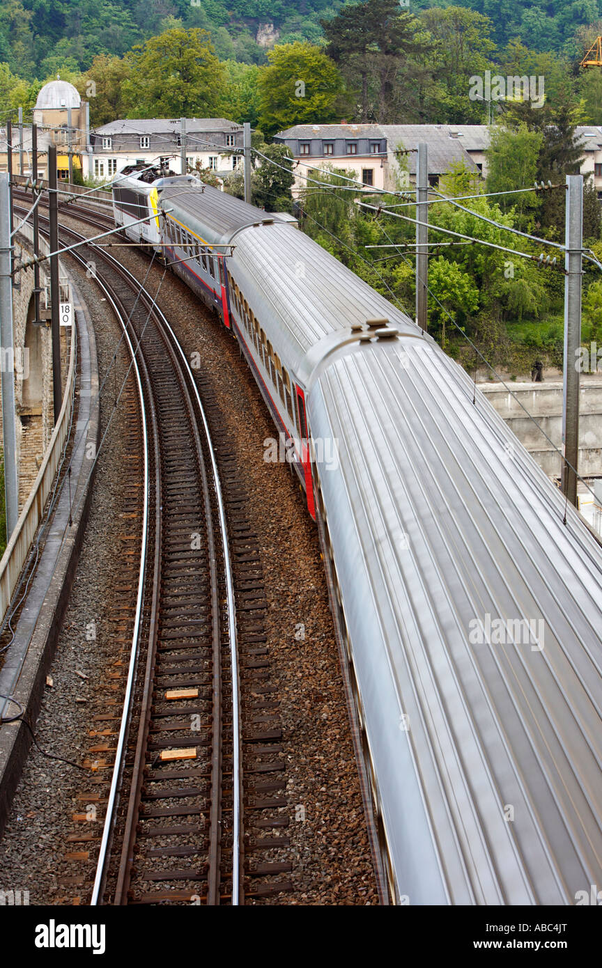 Train passing through the old historic Grund quarter of Luxembourg City ...