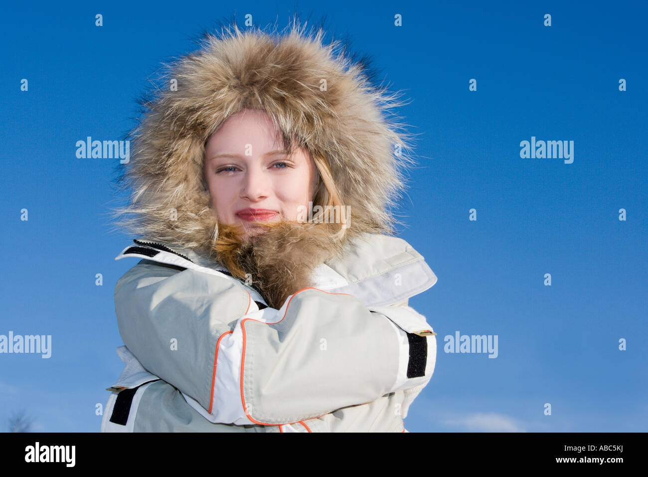 portrait of teenage girl protecting herself from winter coldness Stock ...