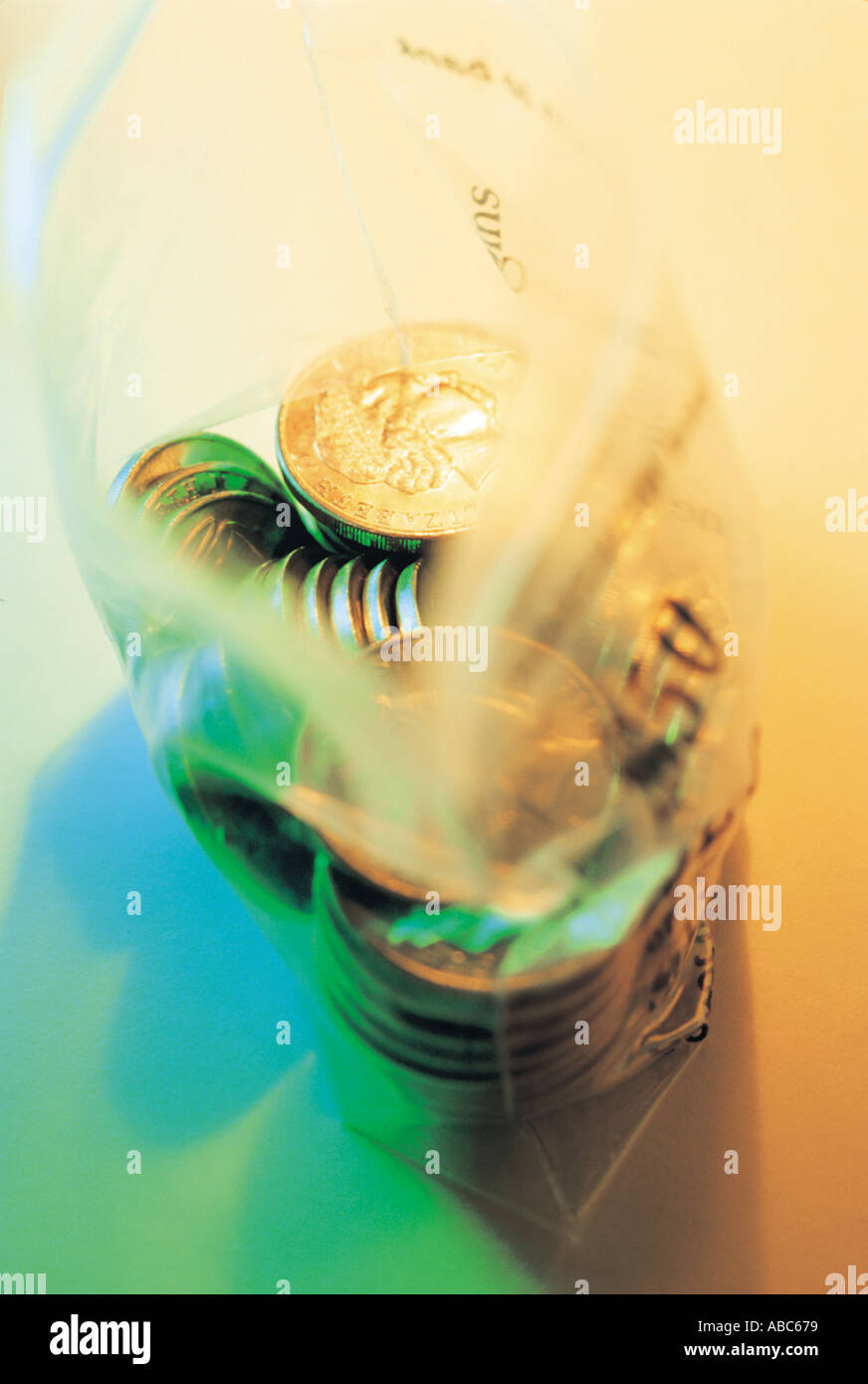 Coins and Notes in Plastic Bag Stock Photo - Alamy