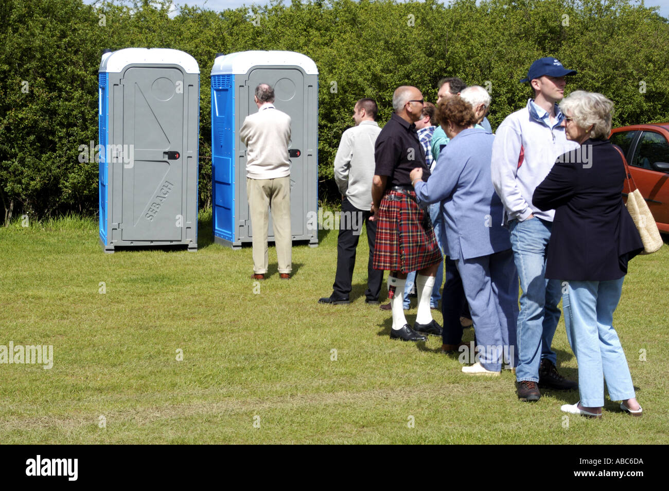 Portable toilet line hi-res stock photography and images - Alamy