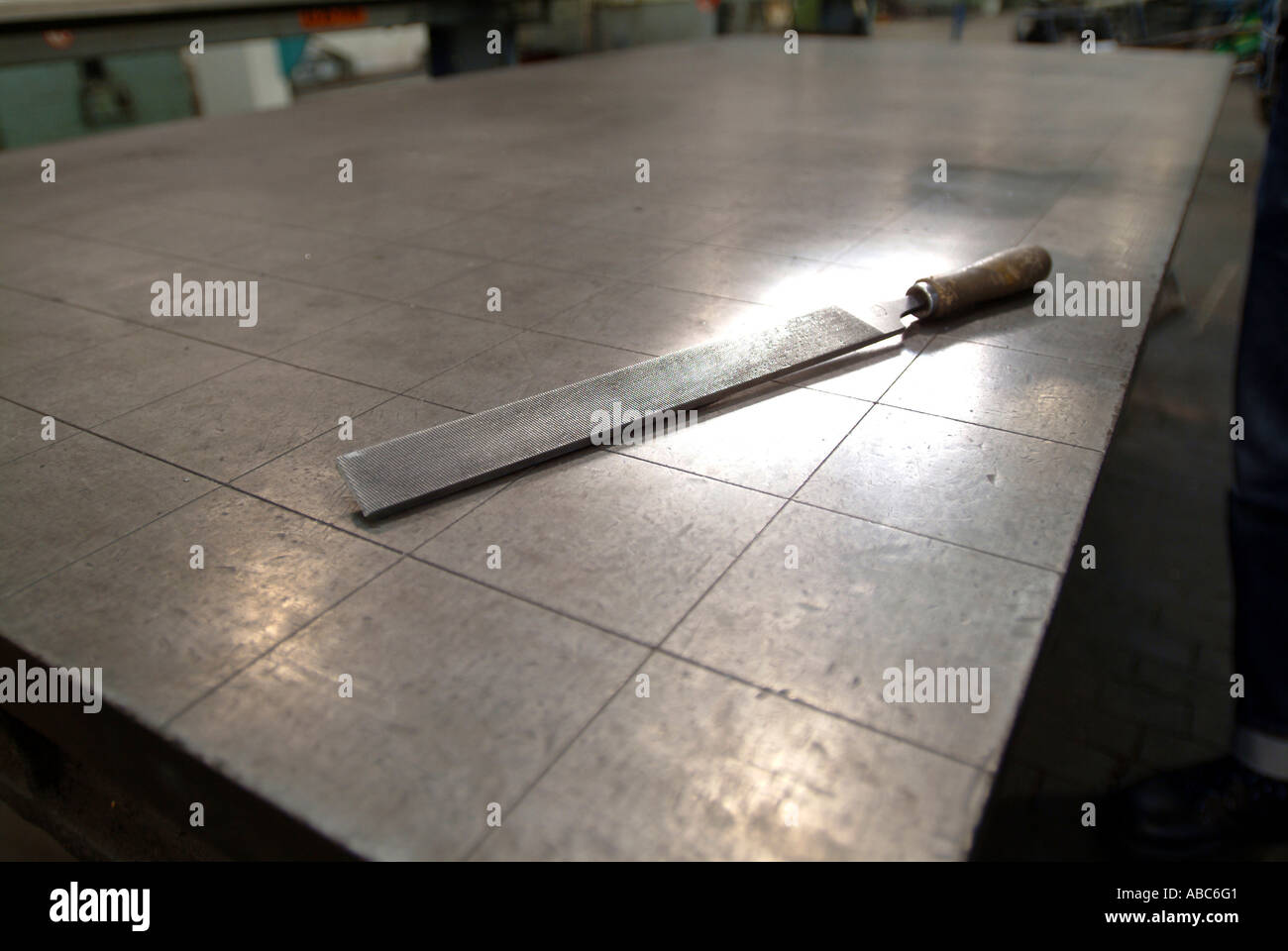 Metal file on marking table Stock Photo - Alamy