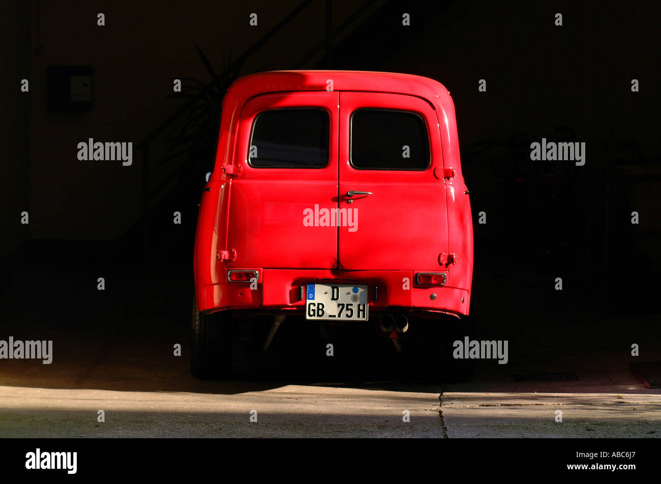 Red Volvo estate in front of dark wall Stock Photo - Alamy