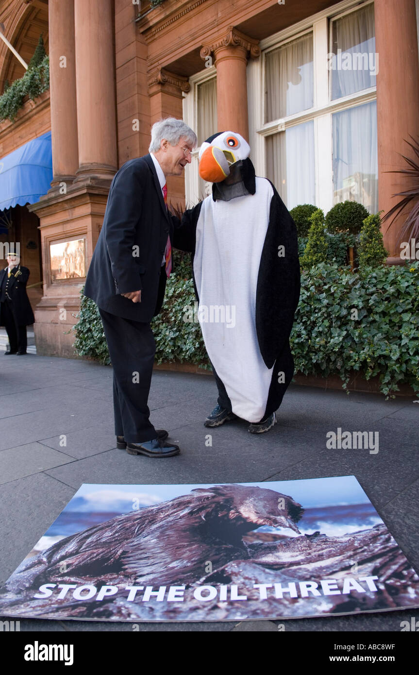 Green MSP Robin Harper and a campaigners dressed as a giant puffin in ...
