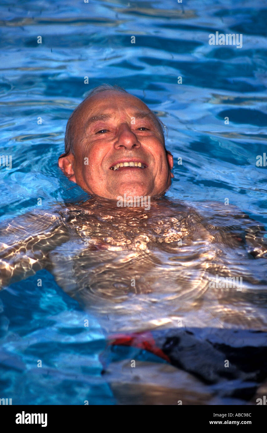 Old man swimming floating in hi-res stock photography and images - Alamy