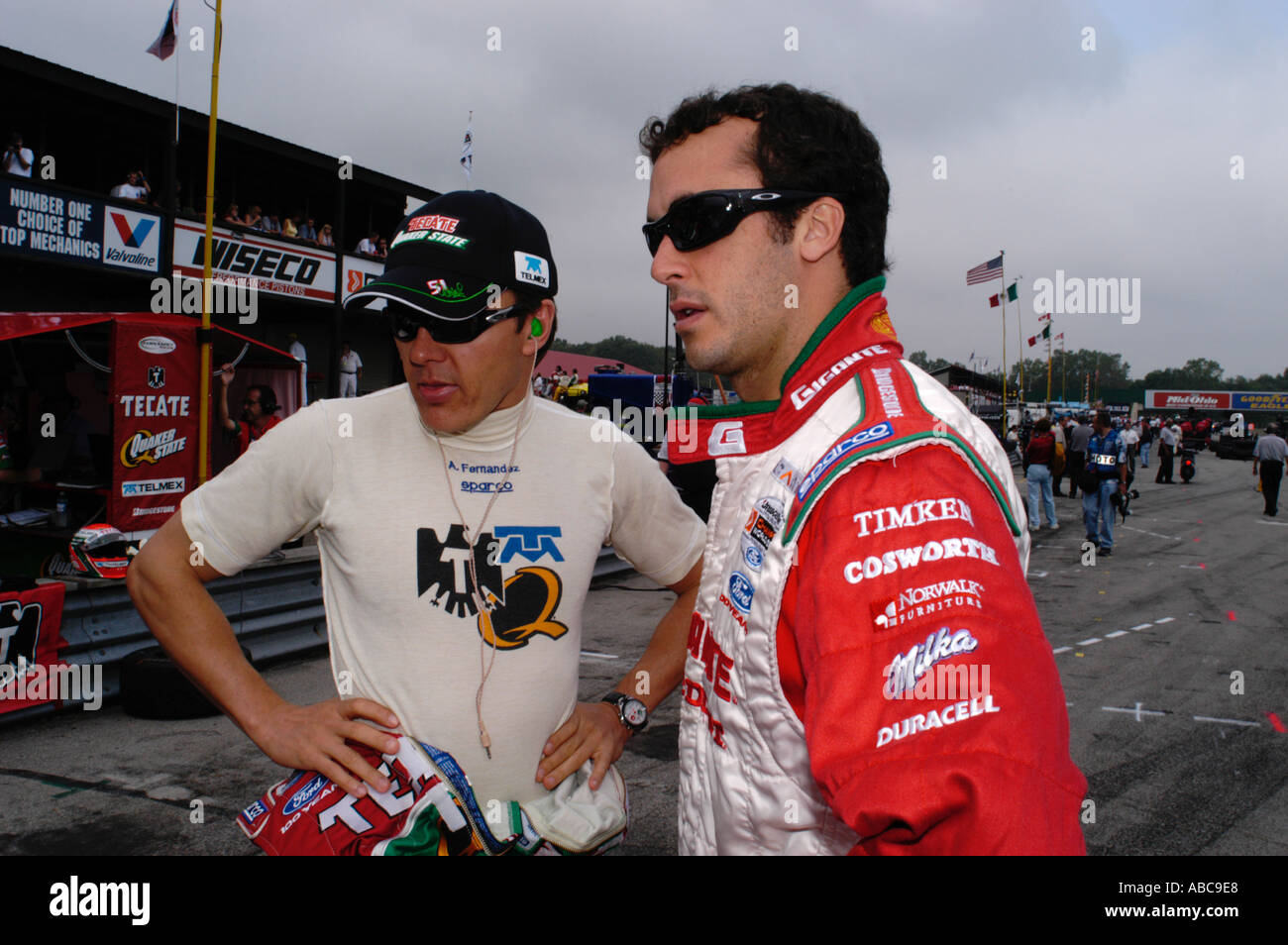 Mexican CART drivers Michel Jourdain Jr and Adrian Ferandez in the pit ...