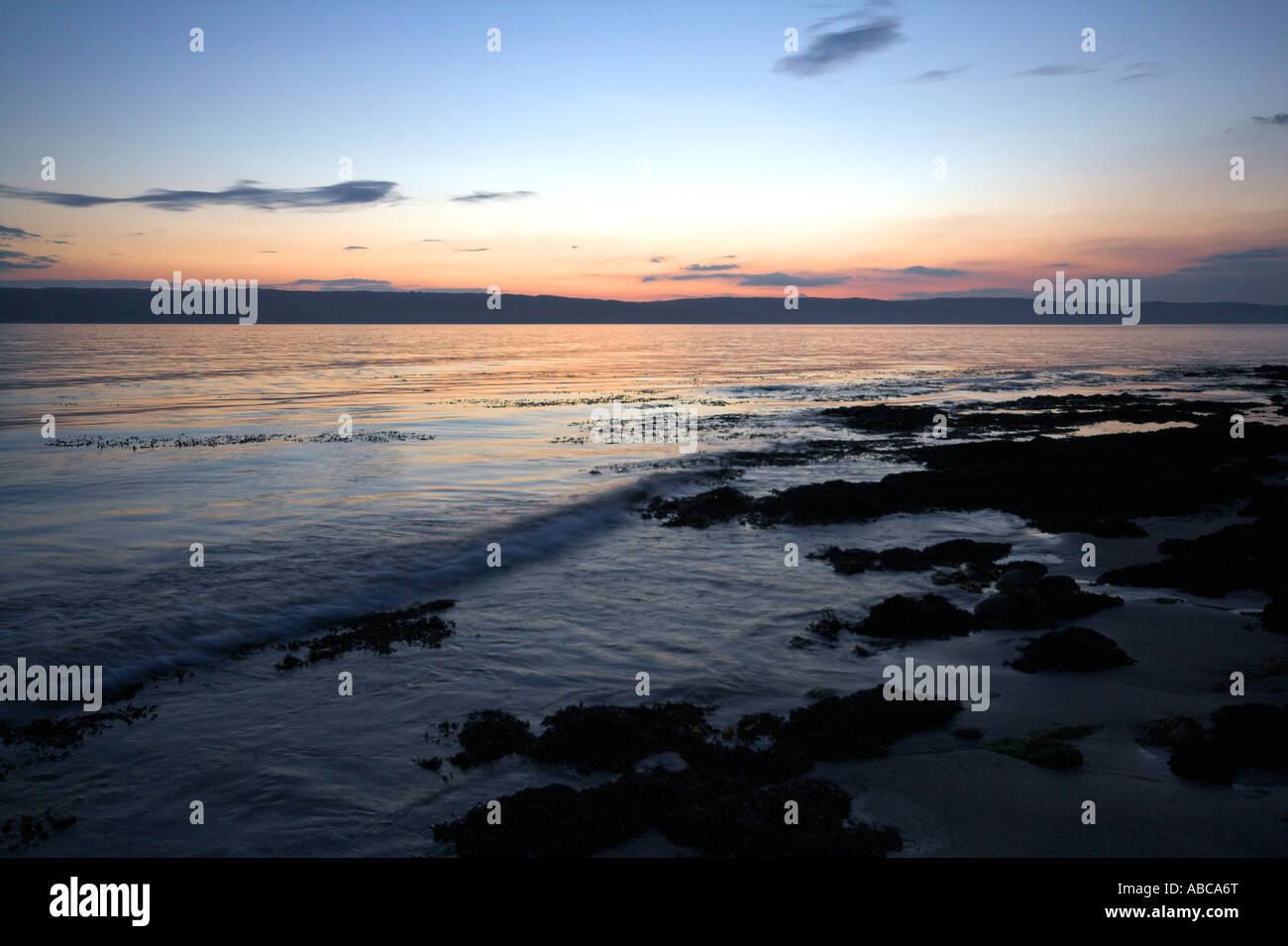 Sunset over the coast of Arran, West Coast of Scotland, UK Stock Photo ...