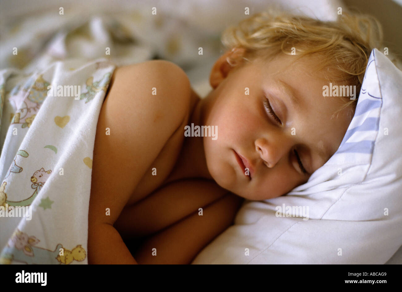 Baby sleeping - Portrait of a two year old baby girl asleep Stock Photo ...