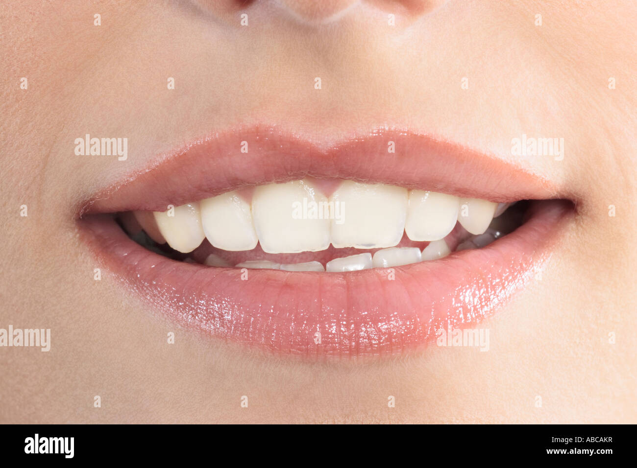 studio shot close up detail of the face of a beautiful young women with ...