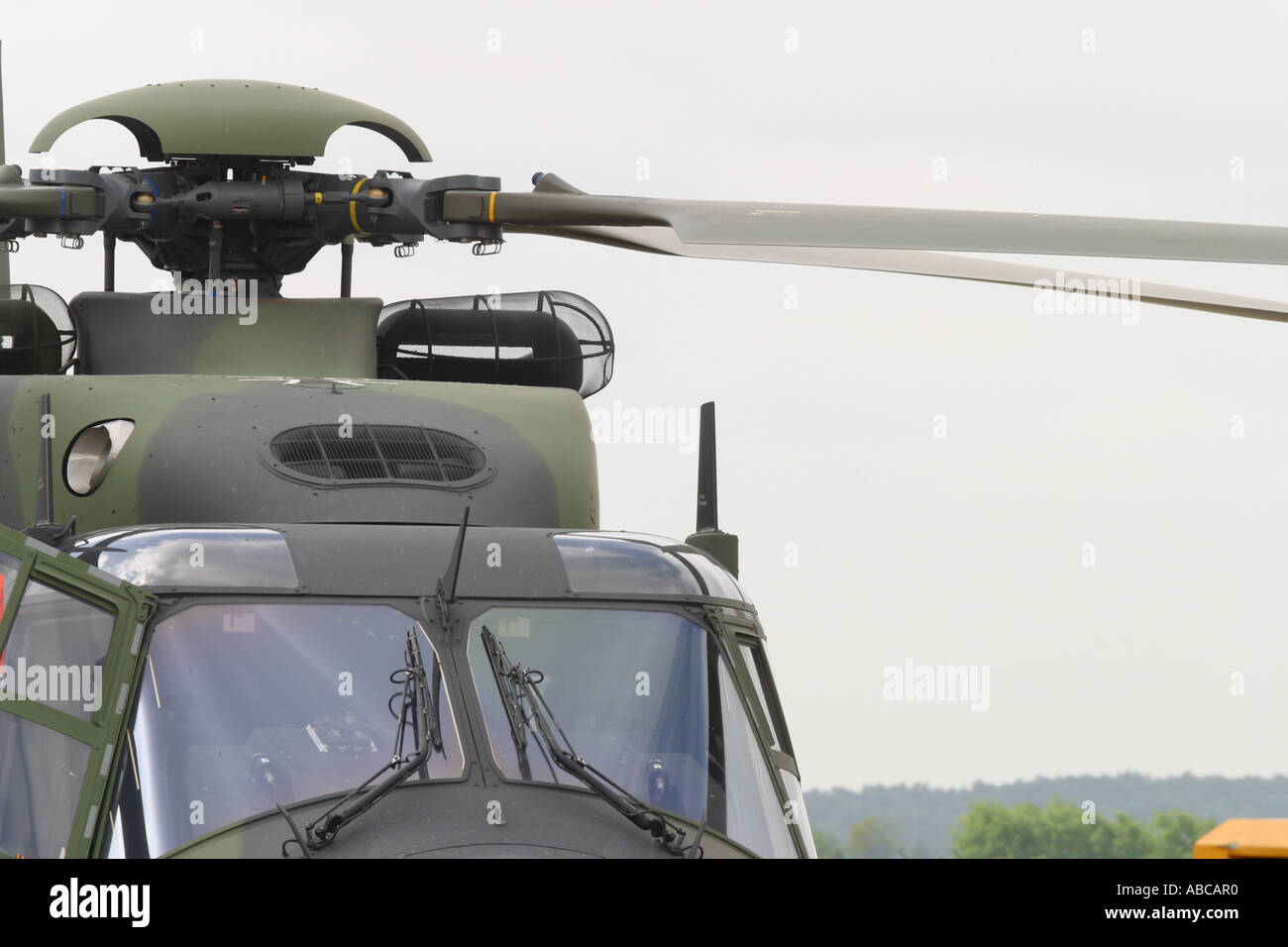 Military helicopter cockpit and rotor blades of the NHI NH-90 joint ...