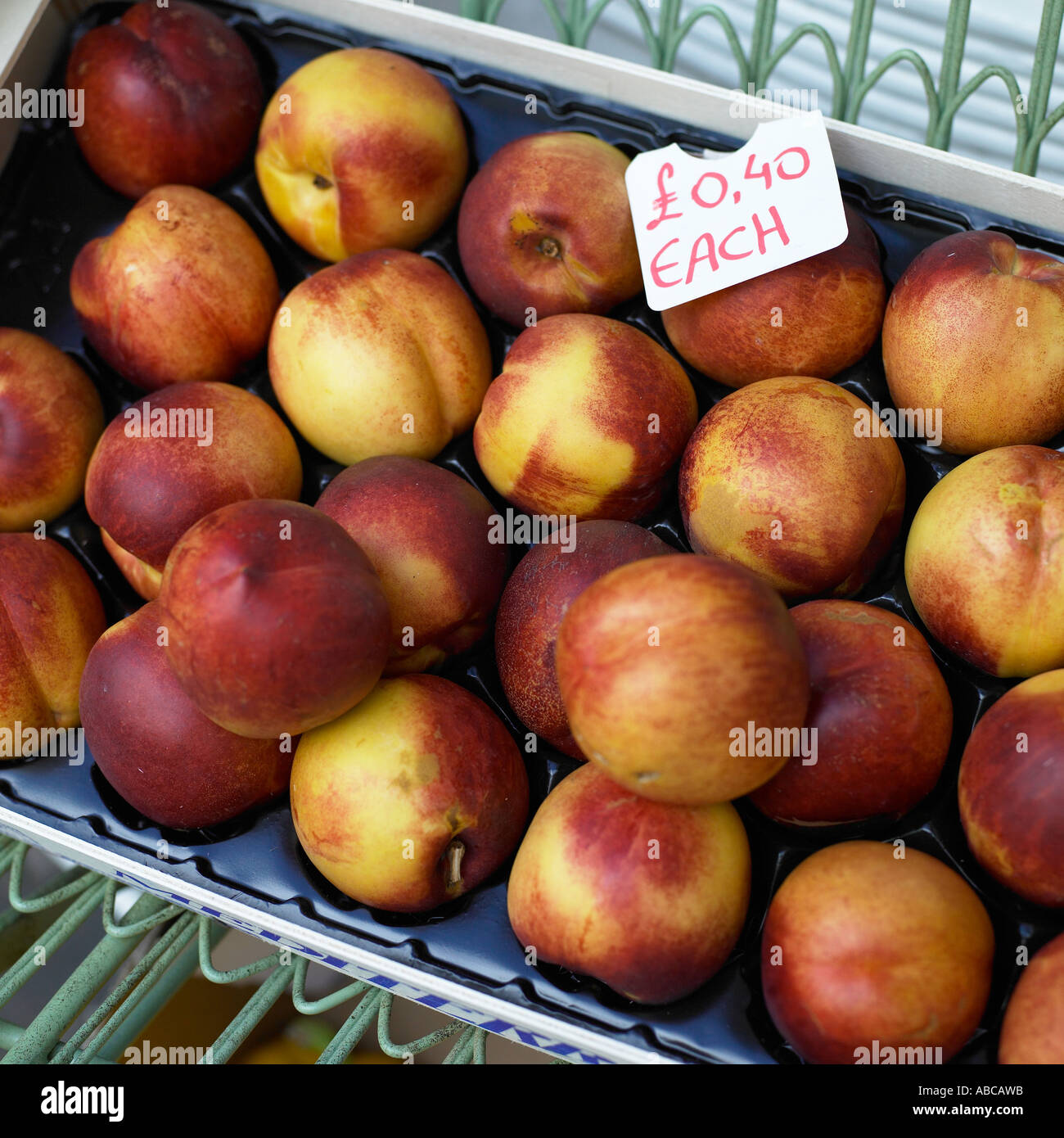 Nectarines on market stall UK Stock Photo - Alamy