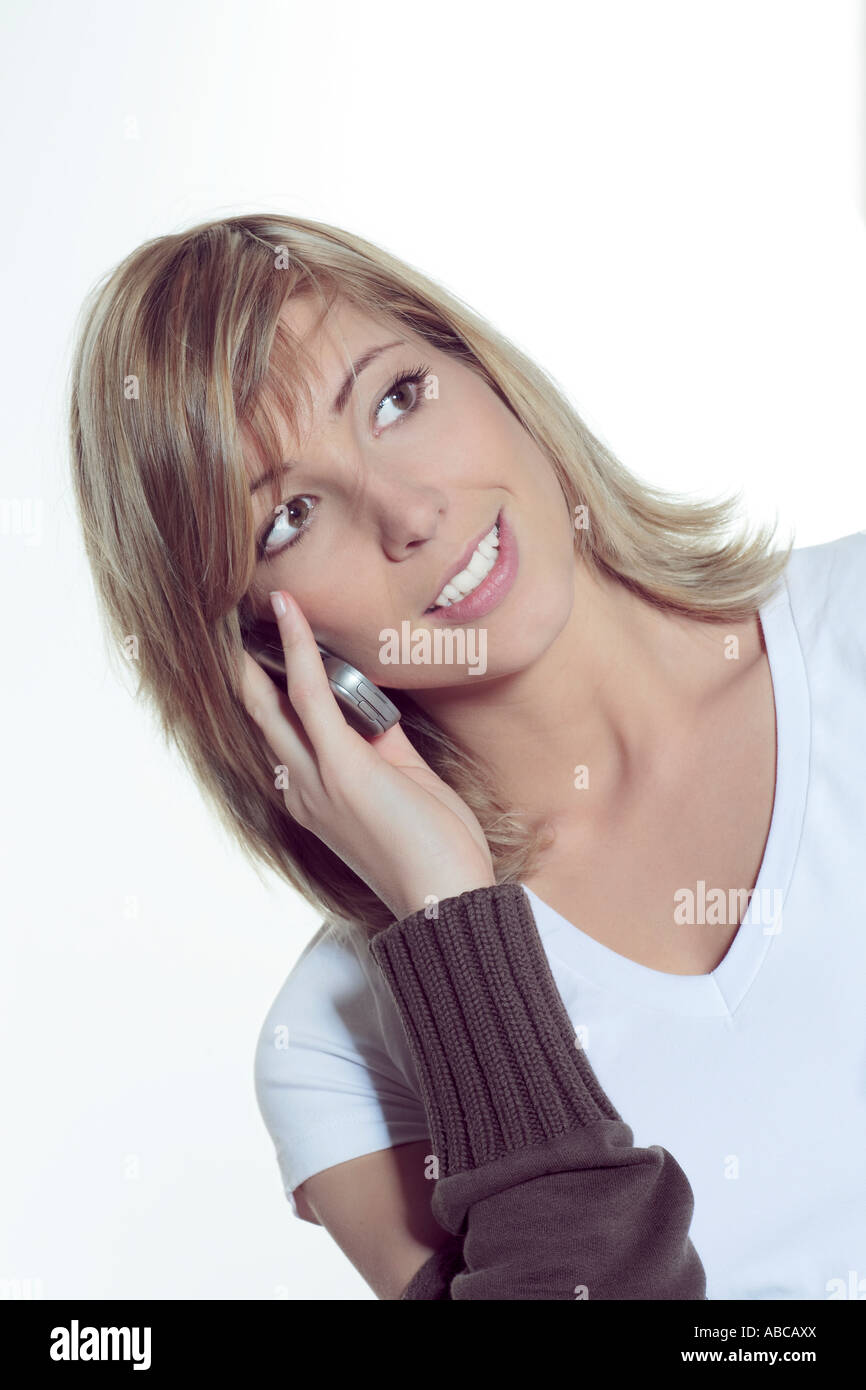 portrait in studio on a white background of a young blond caucasian ...