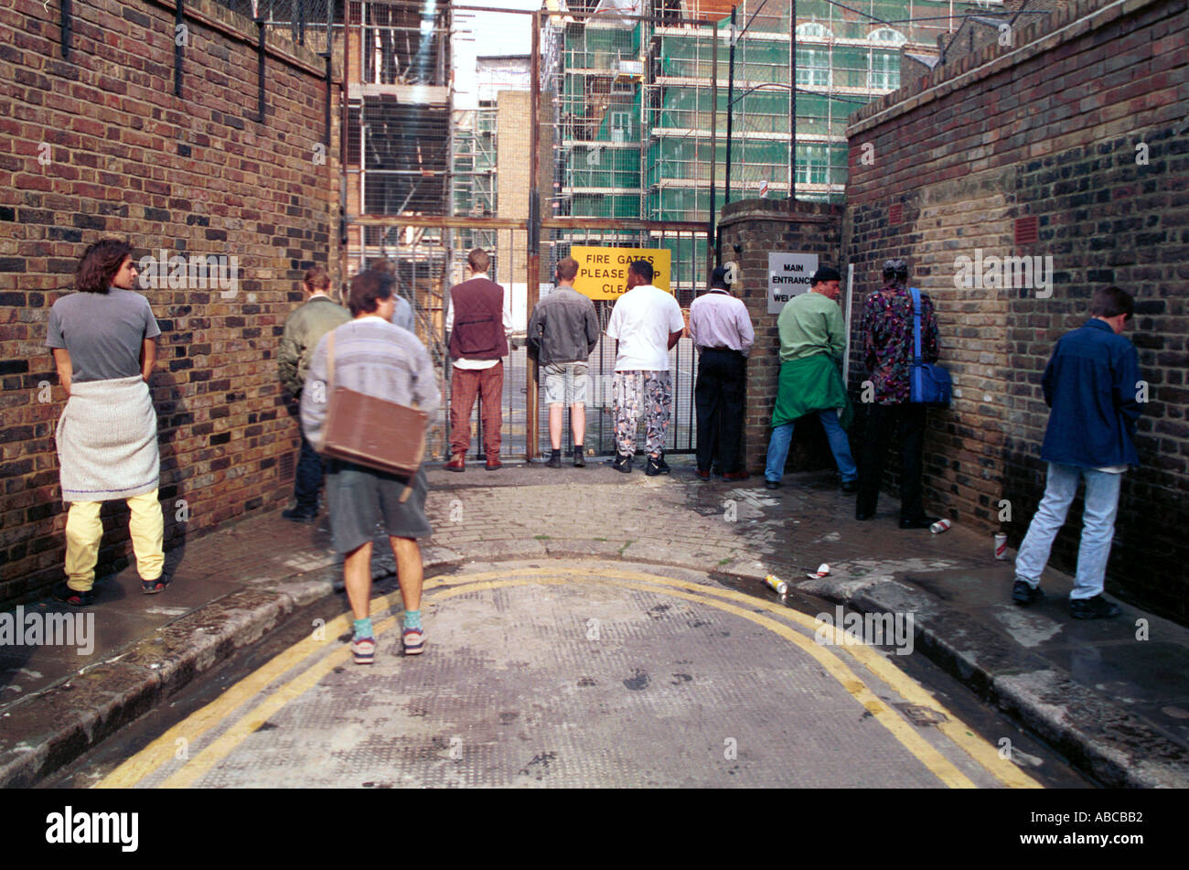 Group Pissing In Open Air Notting Hill Gate London England Britain Uk