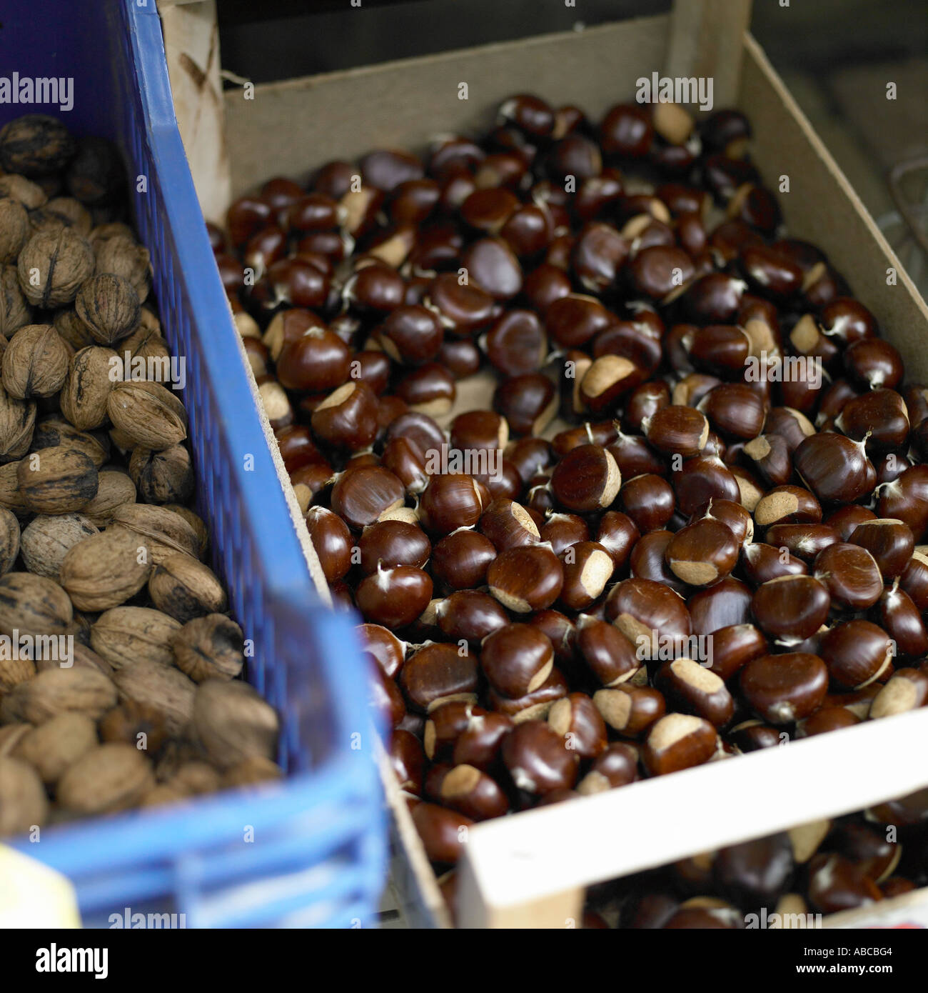 Chestnuts on Italian market stall Stock Photo - Alamy
