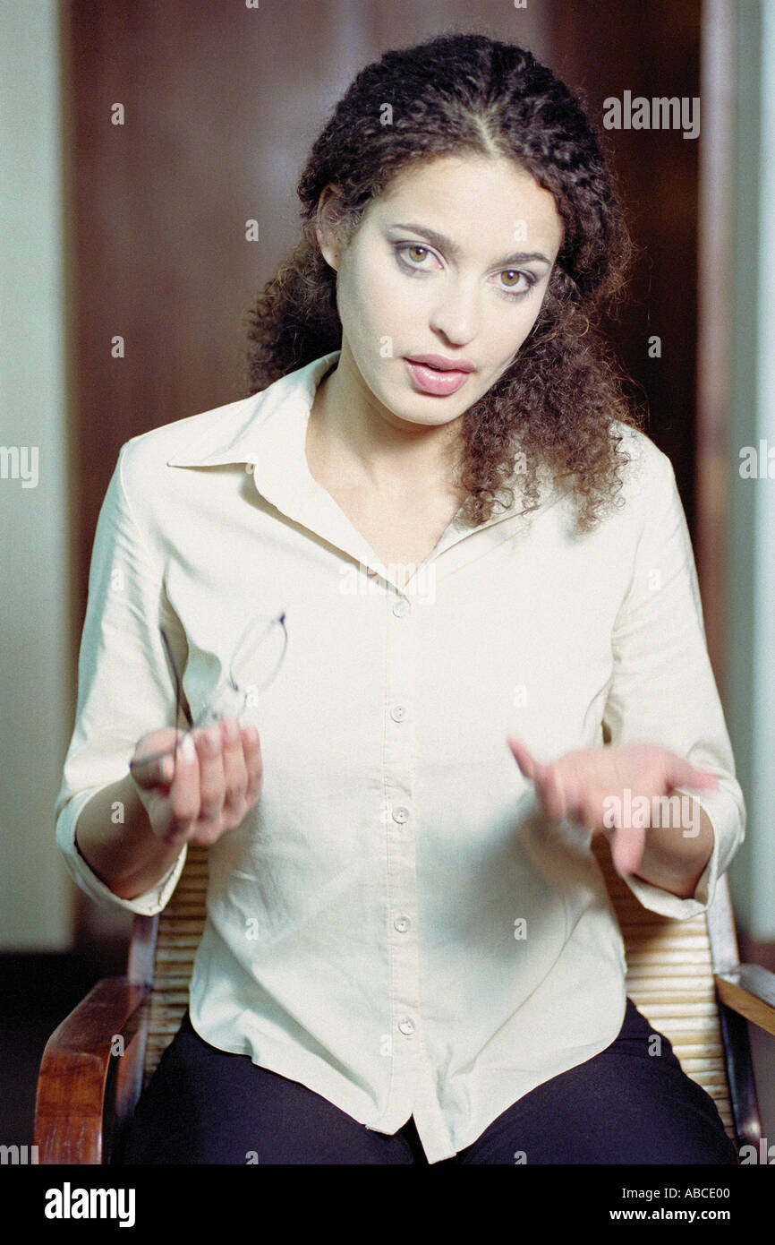 Woman explaining idea Stock Photo - Alamy