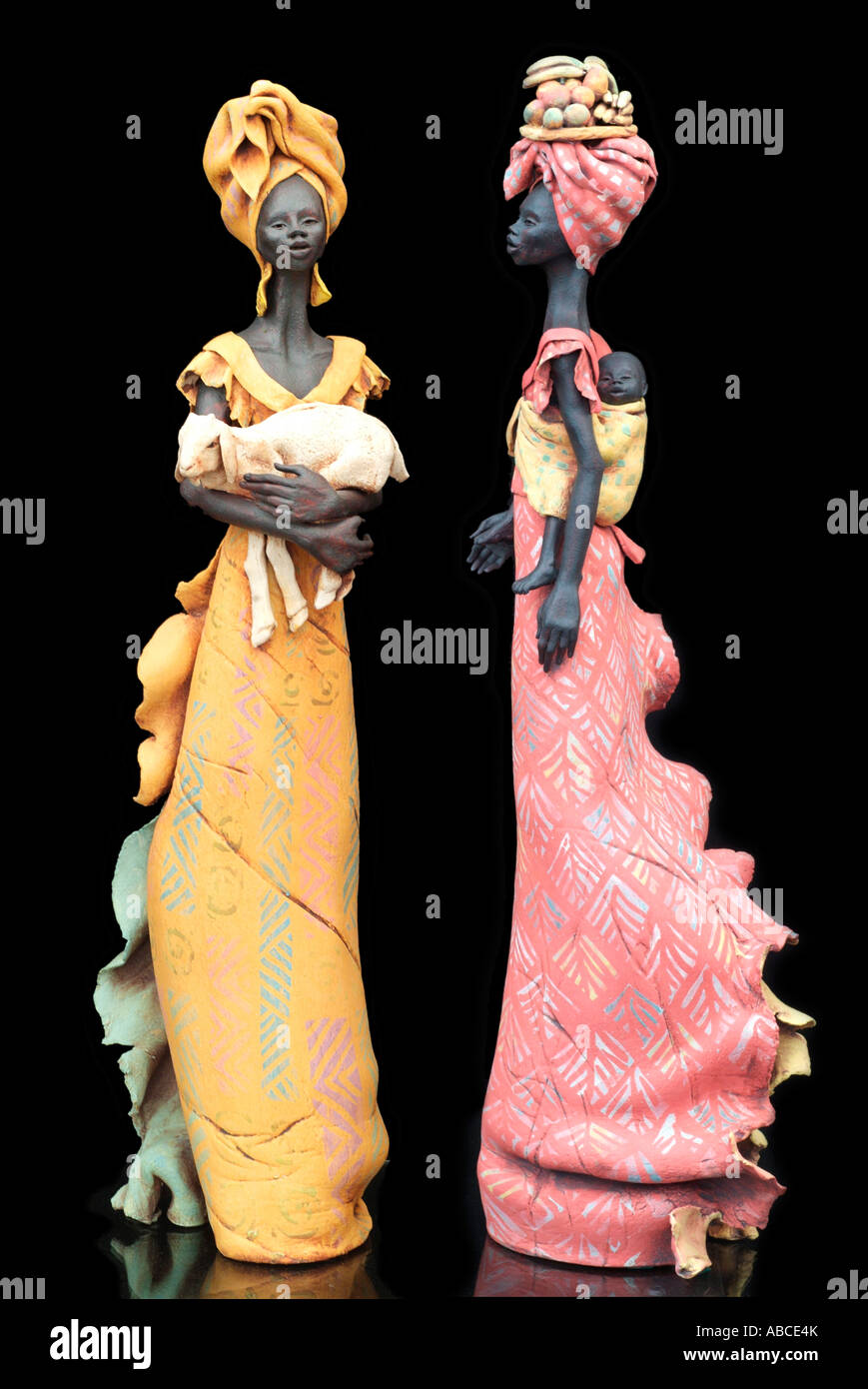 Figurative African female women form stand standing tall thin elongated ...