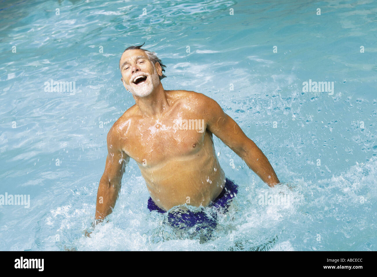 Man in swimming pool Stock Photo - Alamy