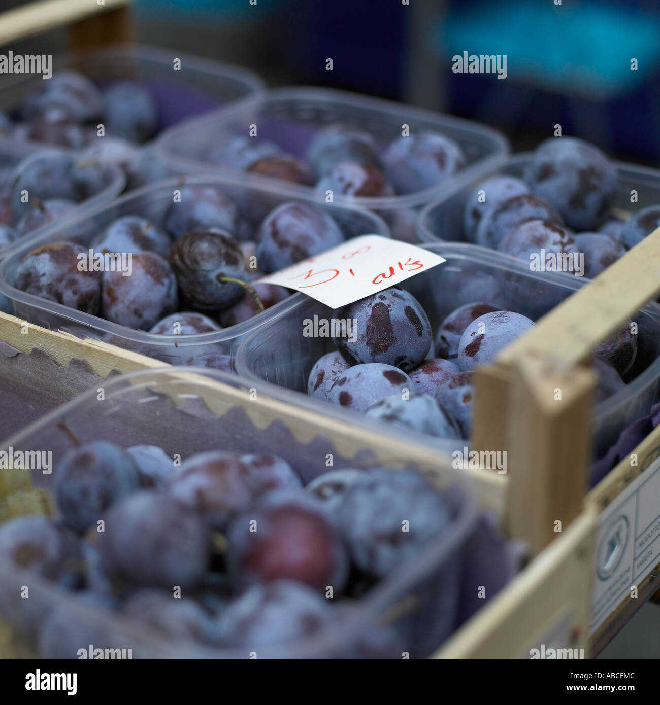 Plums on Italian market stall Stock Photo - Alamy