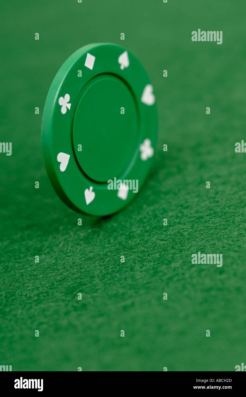 Single green poker chip Stock Photo - Alamy