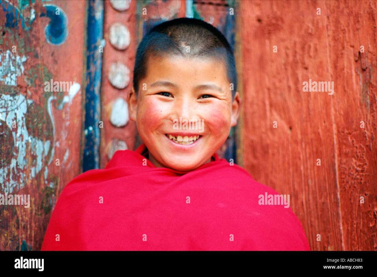 SSA70163 Young Monk looking to the camera with smile Stock Photo - Alamy