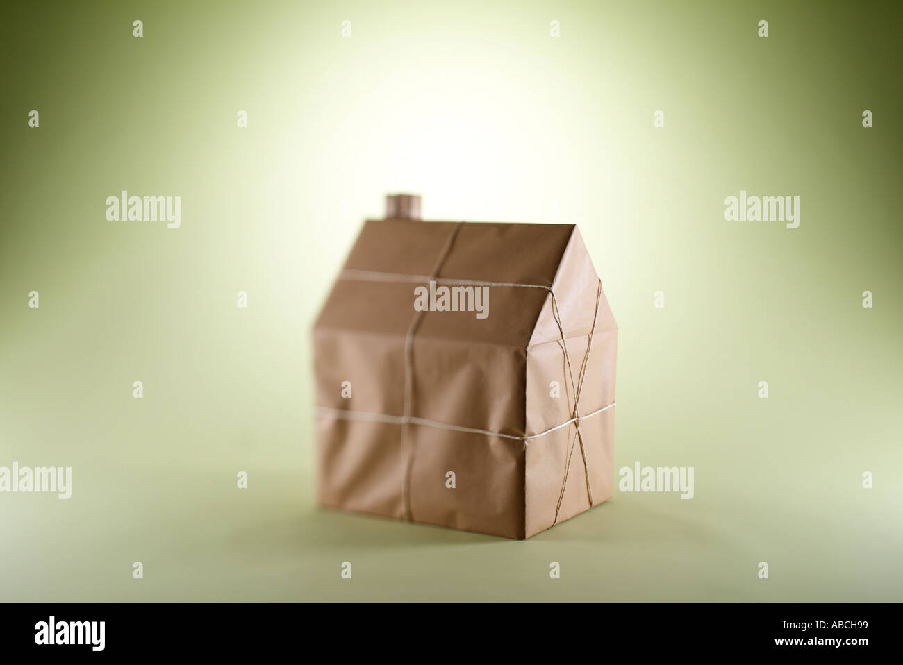 A house wrapped in brown paper Stock Photo - Alamy