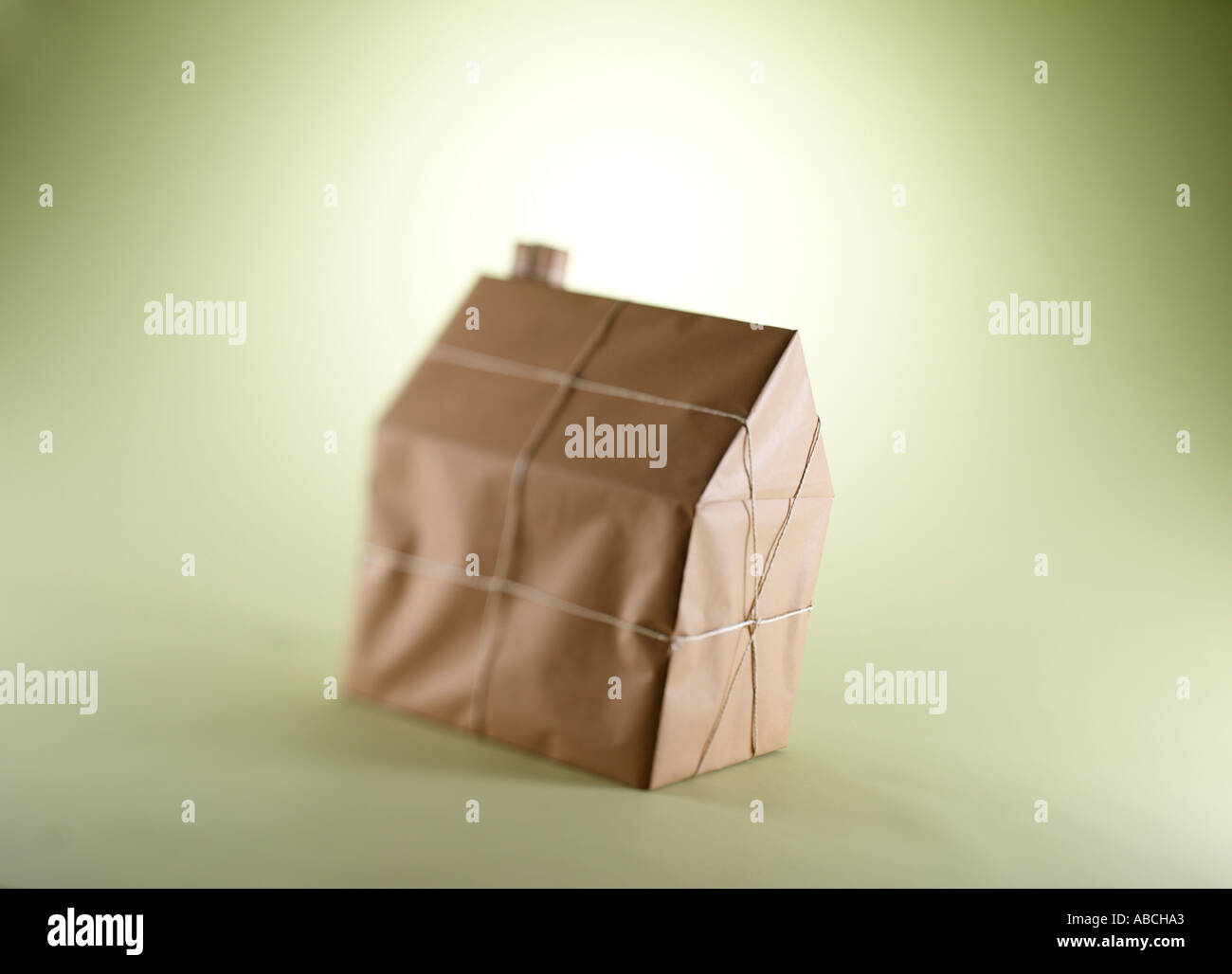 A house wrapped in brown paper angled view Stock Photo - Alamy