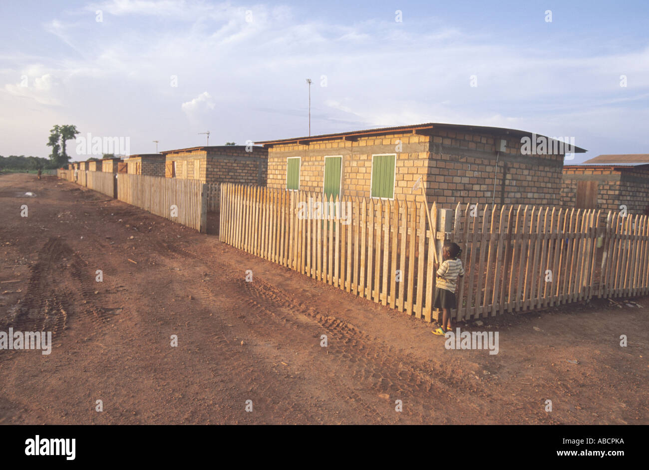 Typical new housing in an expanding rainforest town in the Republic of ...