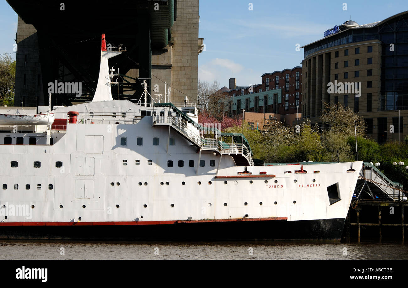 The disco boat “Tuxedo Princess” next to the Tyne Bridge between ...