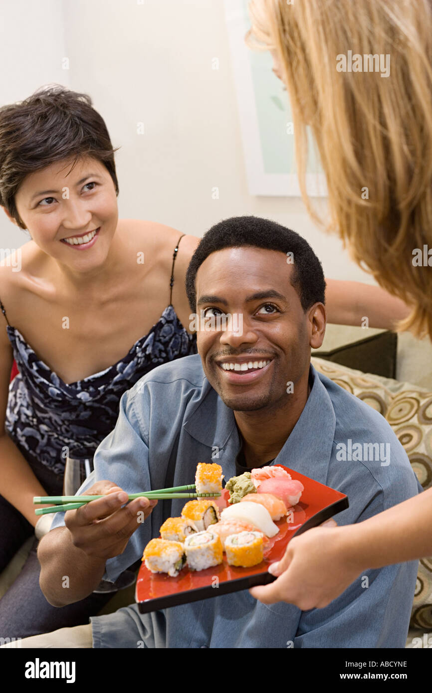 Smiling asian hostess hi-res stock photography and images - Alamy