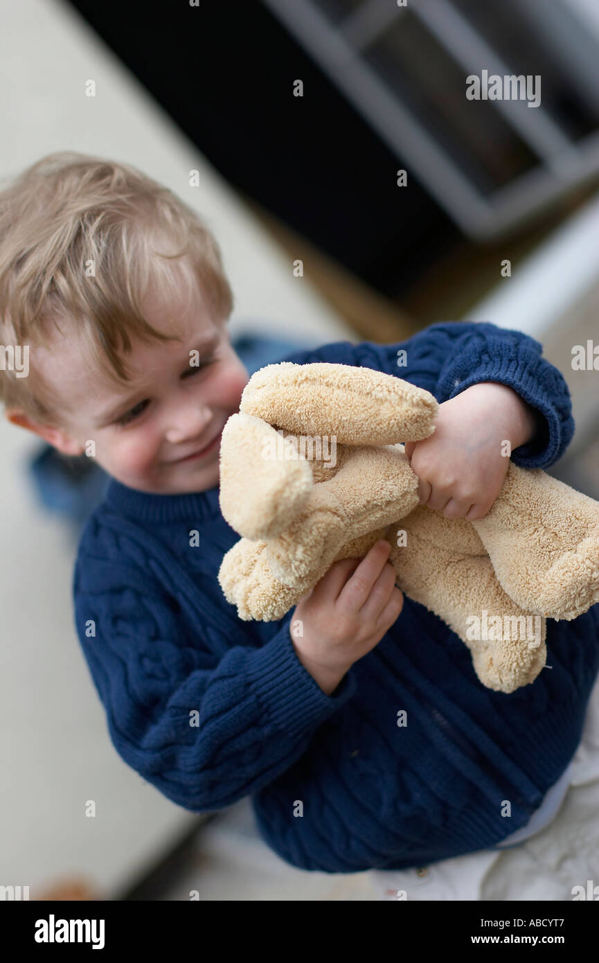 boy with soft toy Stock Photo - Alamy