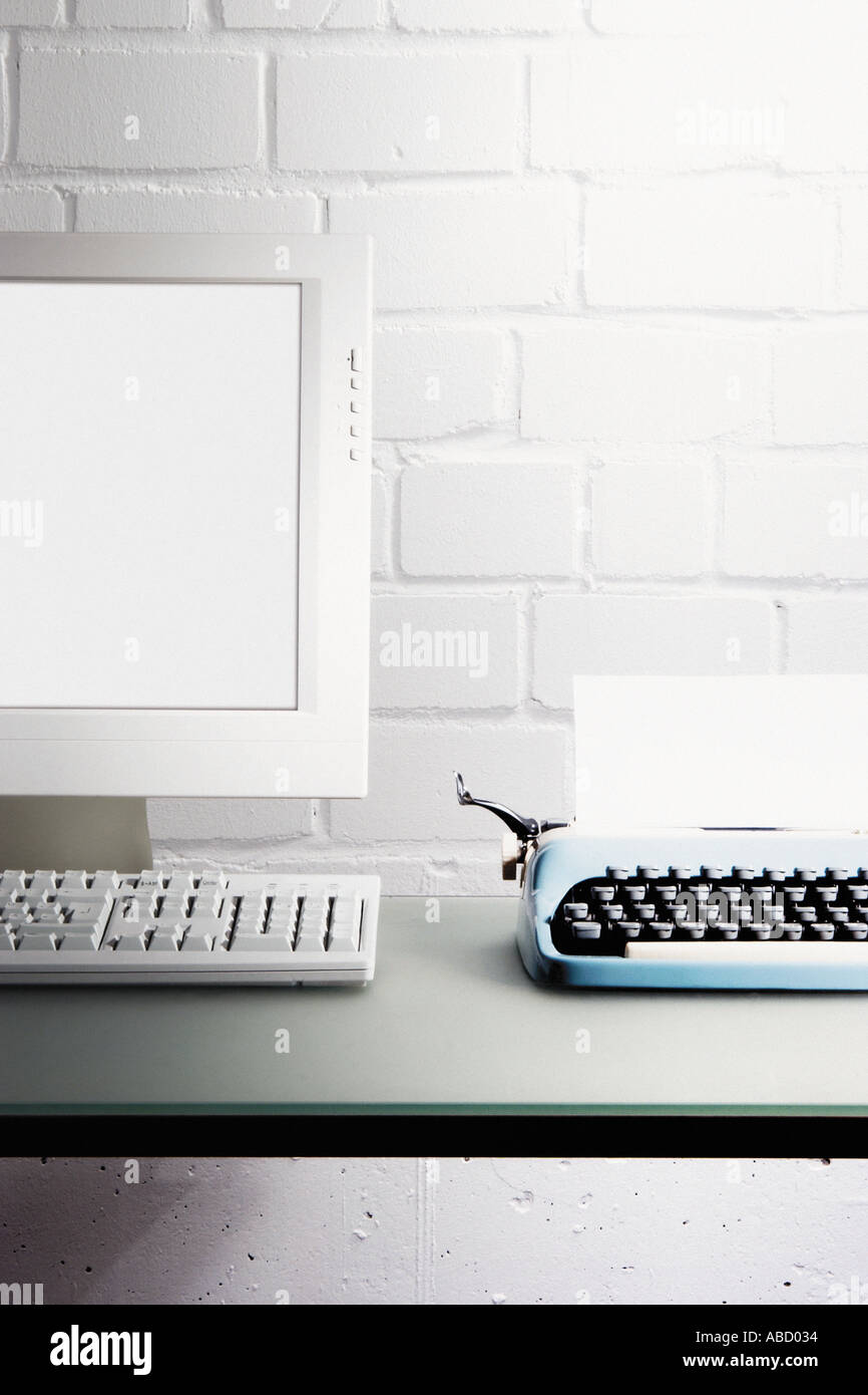Computer and typewriter Stock Photo - Alamy