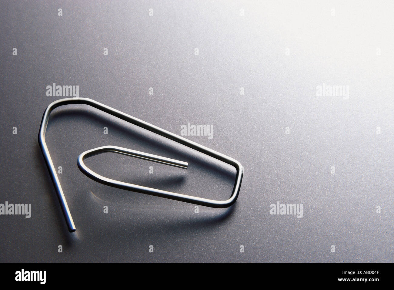Bent Paper Clip Paper Stock Photos & Bent Paper Clip Paper Stock Images ...