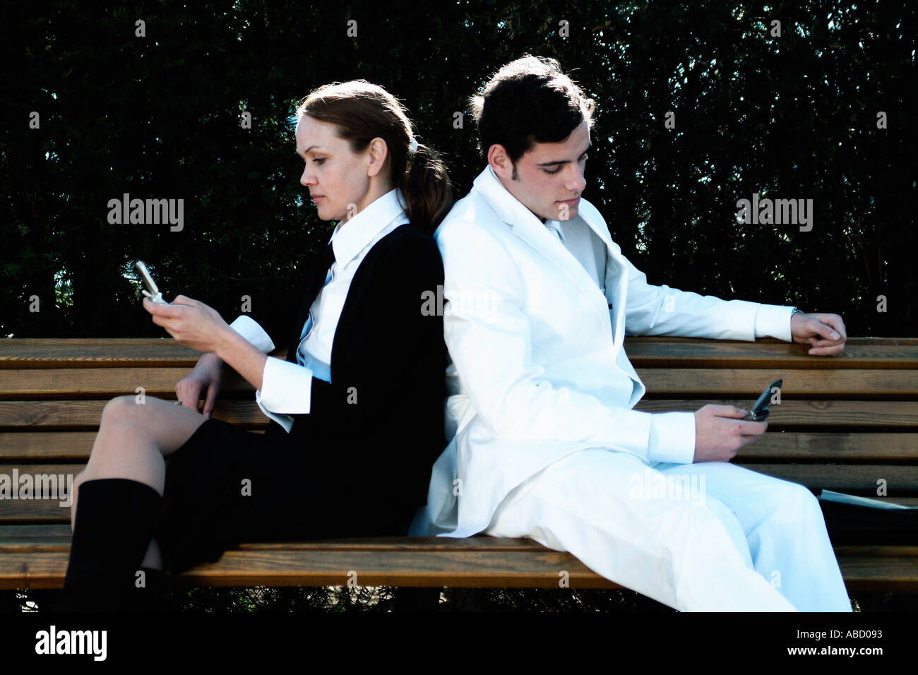 Business people sending text messages Stock Photo - Alamy