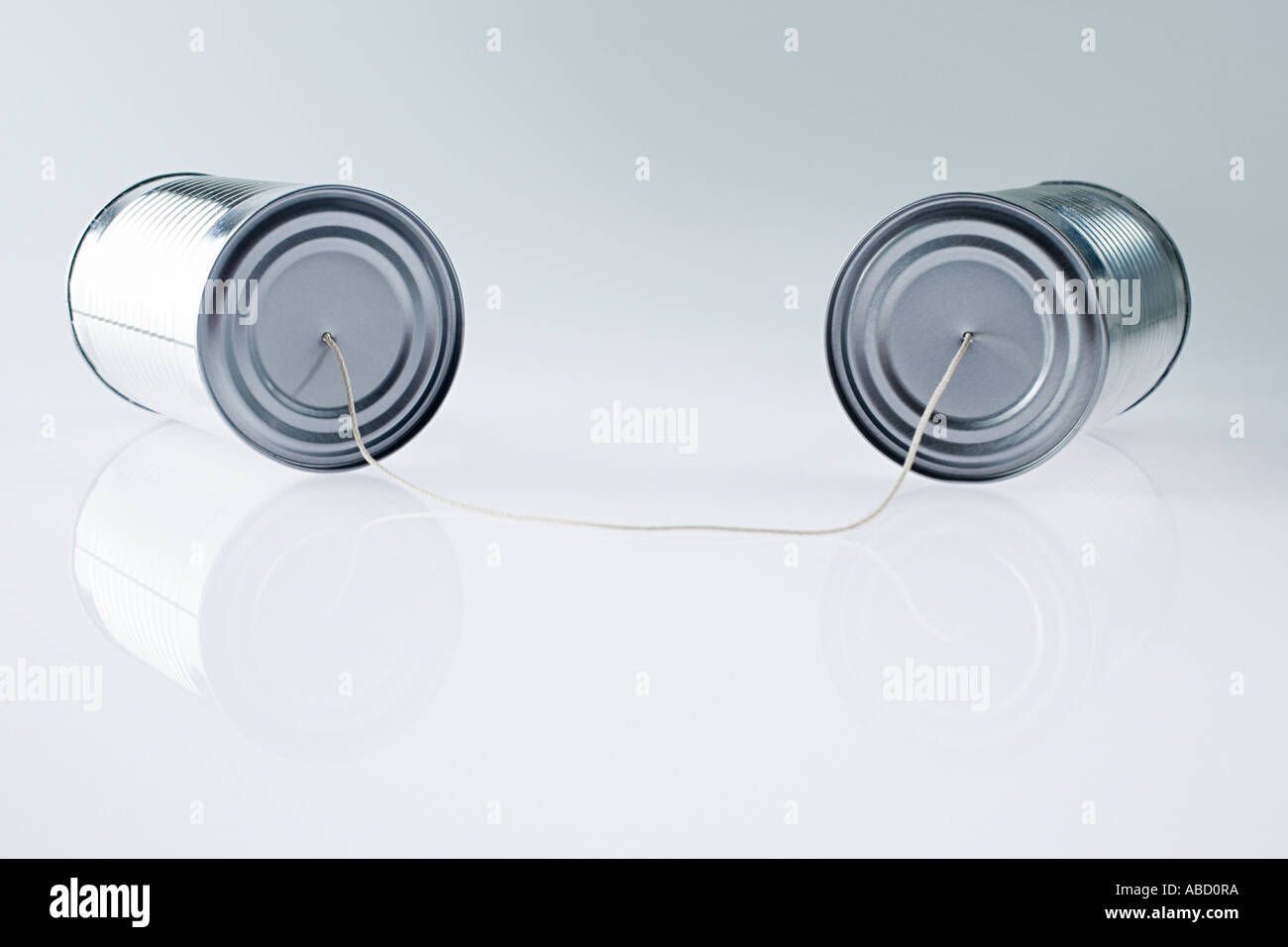 Tin can phone Stock Photo - Alamy