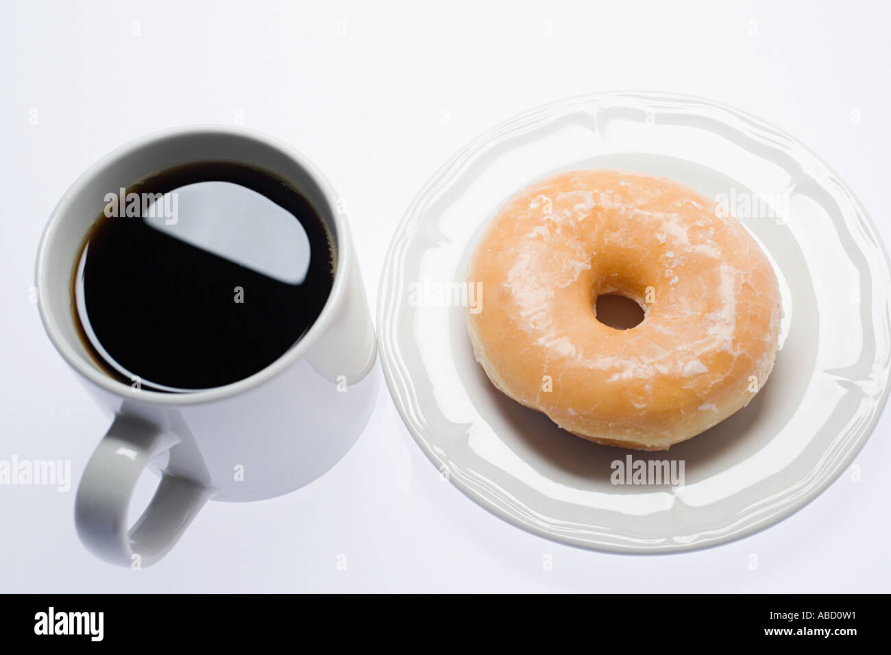 Coffee and a doughnut Stock Photo - Alamy