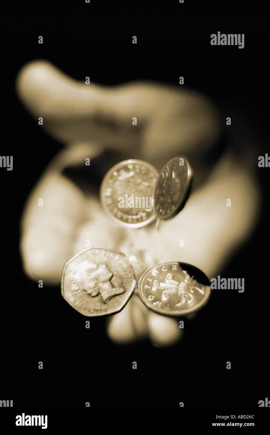 Handing money pound hi-res stock photography and images - Alamy