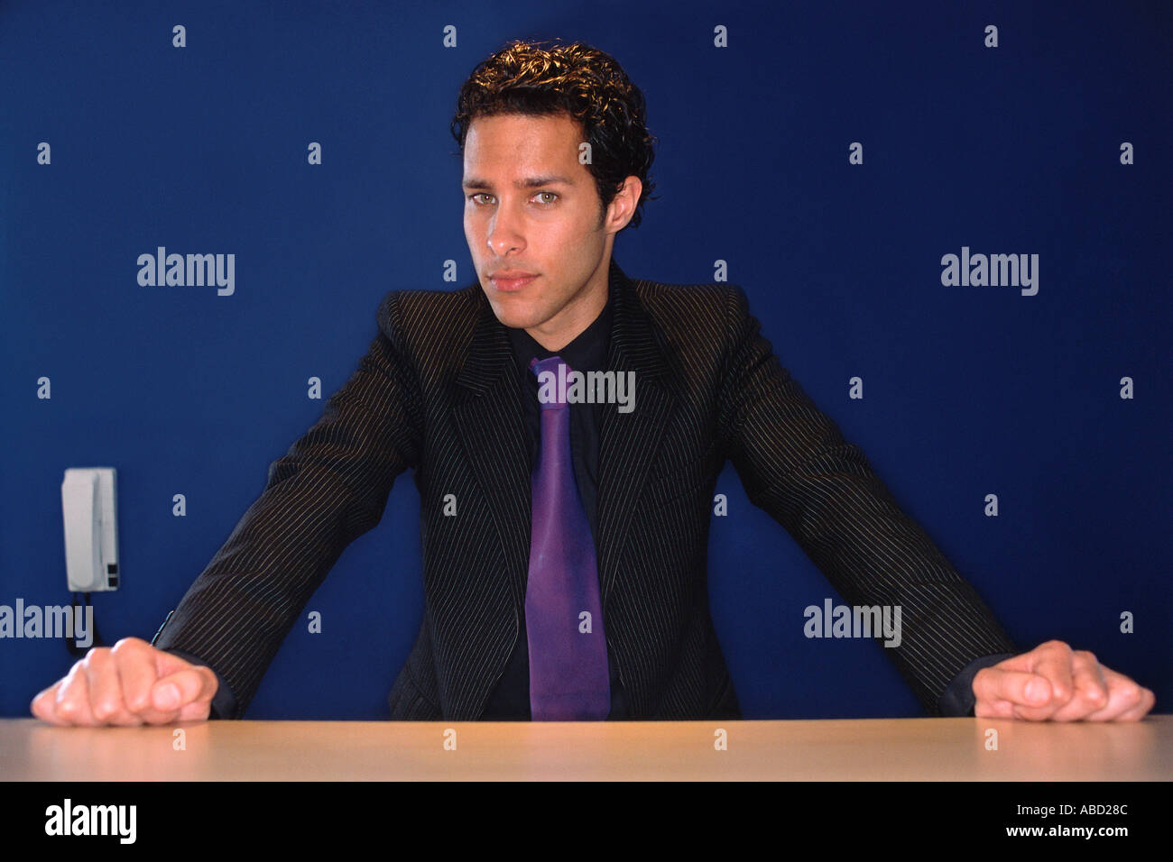 Portrait of self-assured young male Stock Photo - Alamy