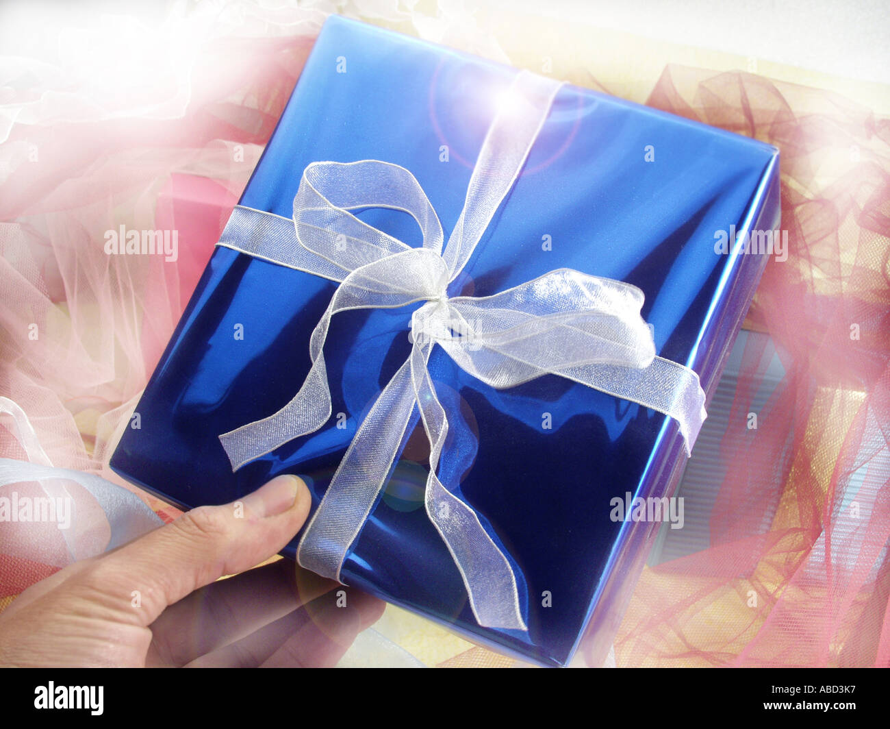 Gift package with ribbon Stock Photo - Alamy