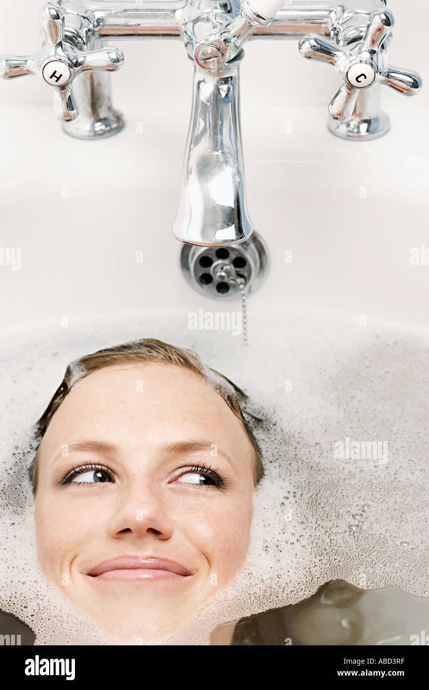 Woman having a bath Stock Photo - Alamy