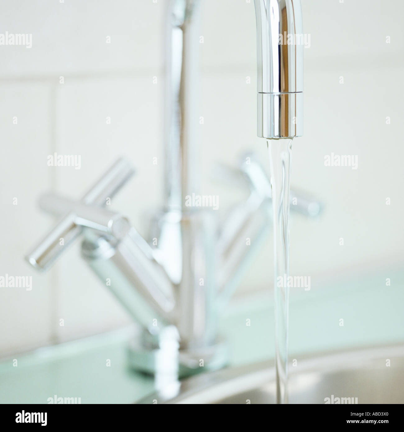 Tap and running water Stock Photo - Alamy