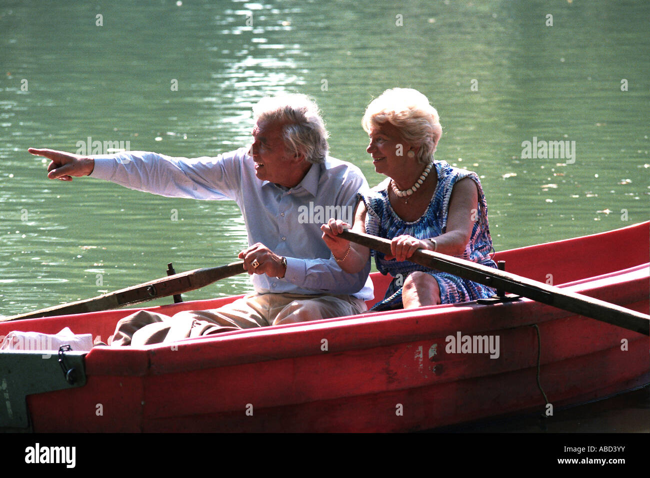 An old couple in a rowboat hi-res stock photography and images - Alamy