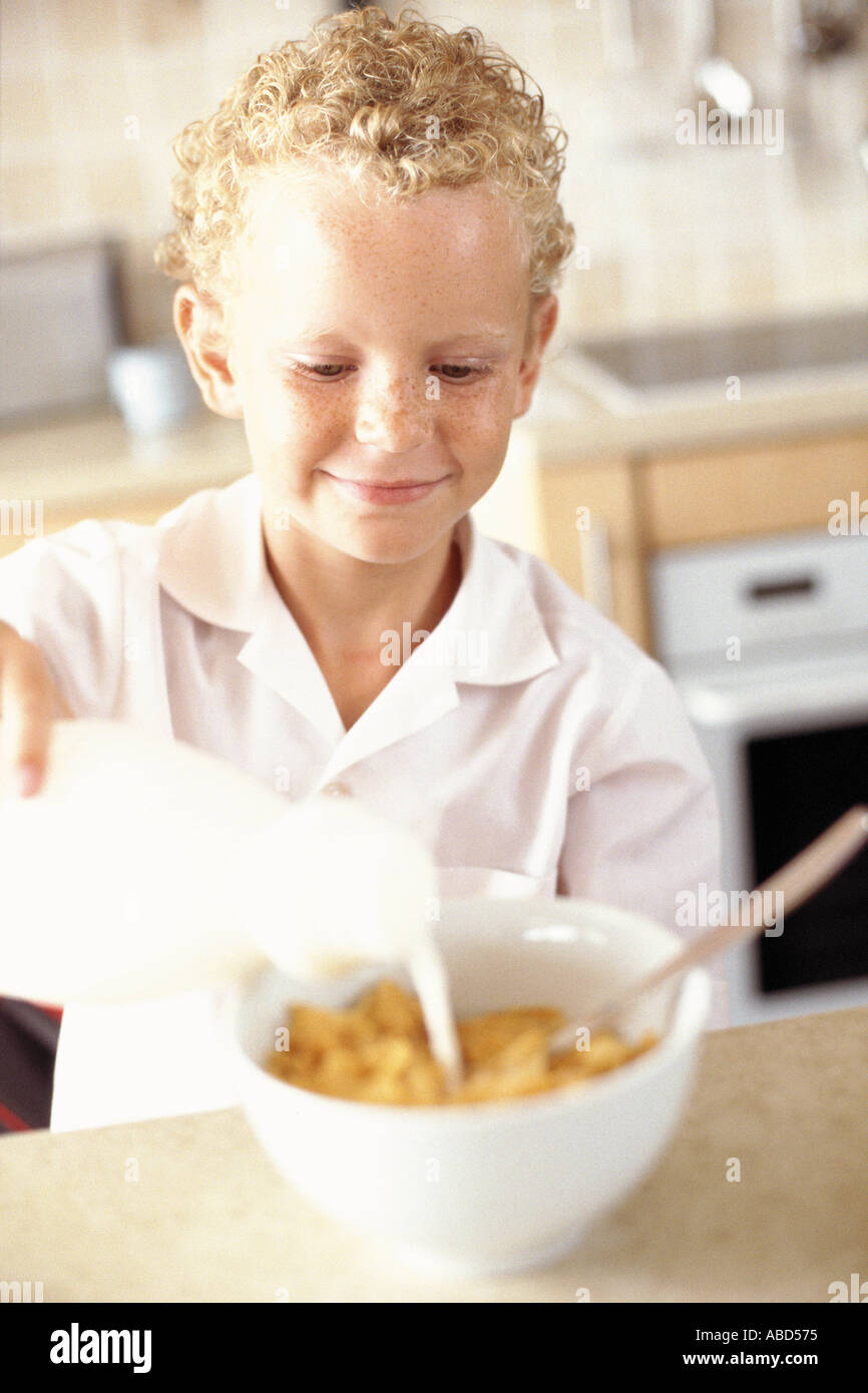 Boy having breakfast Stock Photo - Alamy